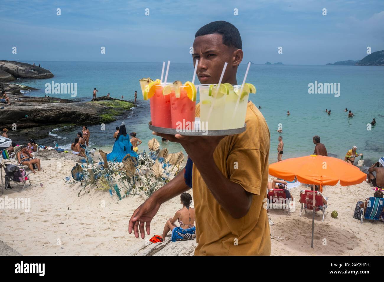 Beach vendor sells colorful batidas, a Brazilian cocktail made with ...