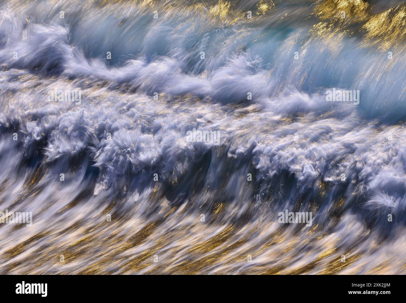 Artistic capture of waves using a slow shutter speed to emphasize the ...
