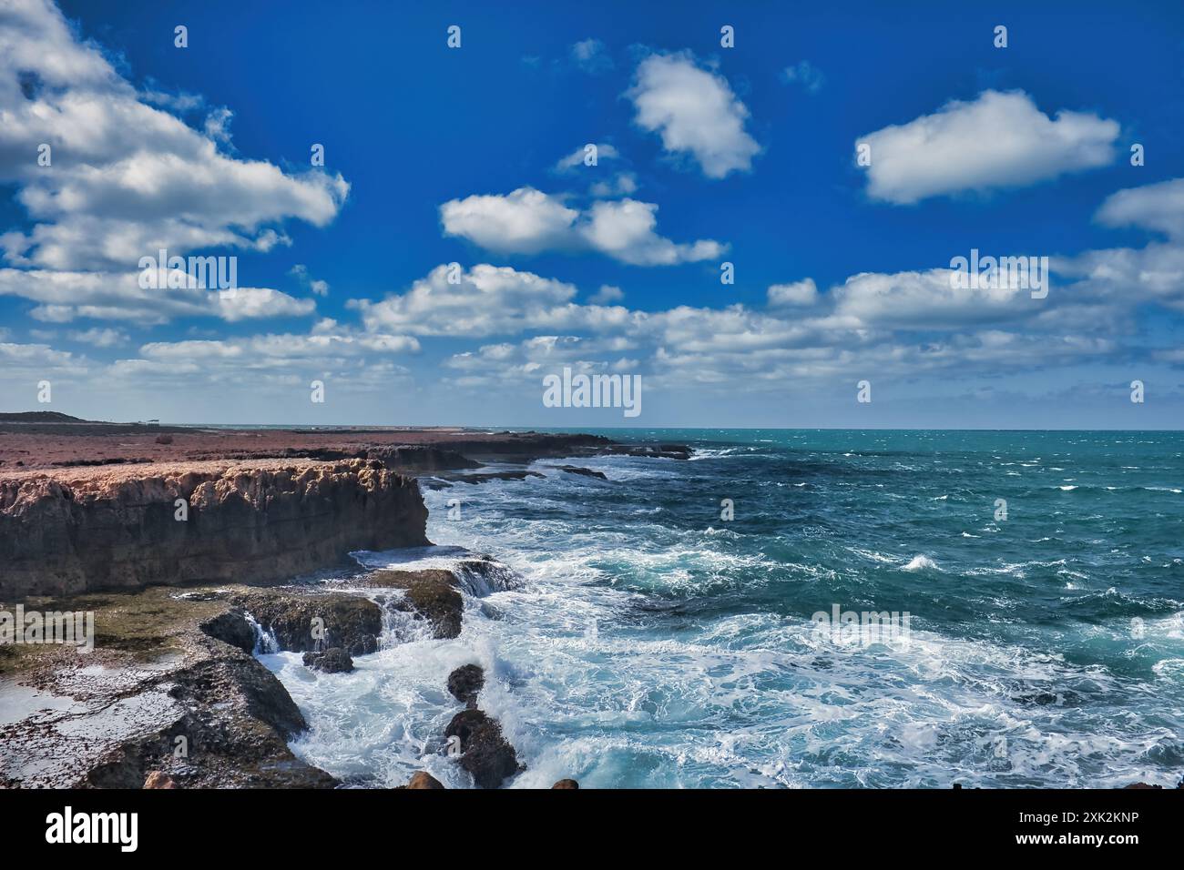 Spectacular rugged coastline on a stormy day, at Point Quobba, a remote ...