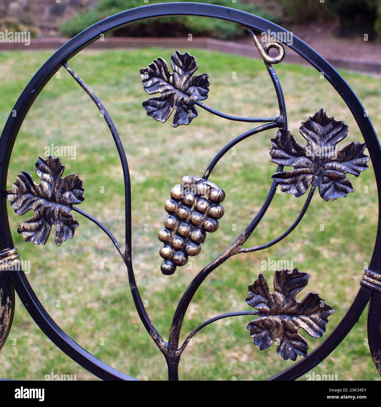 Decorative decoration of a metal fence with forged elements. Bunch of ...