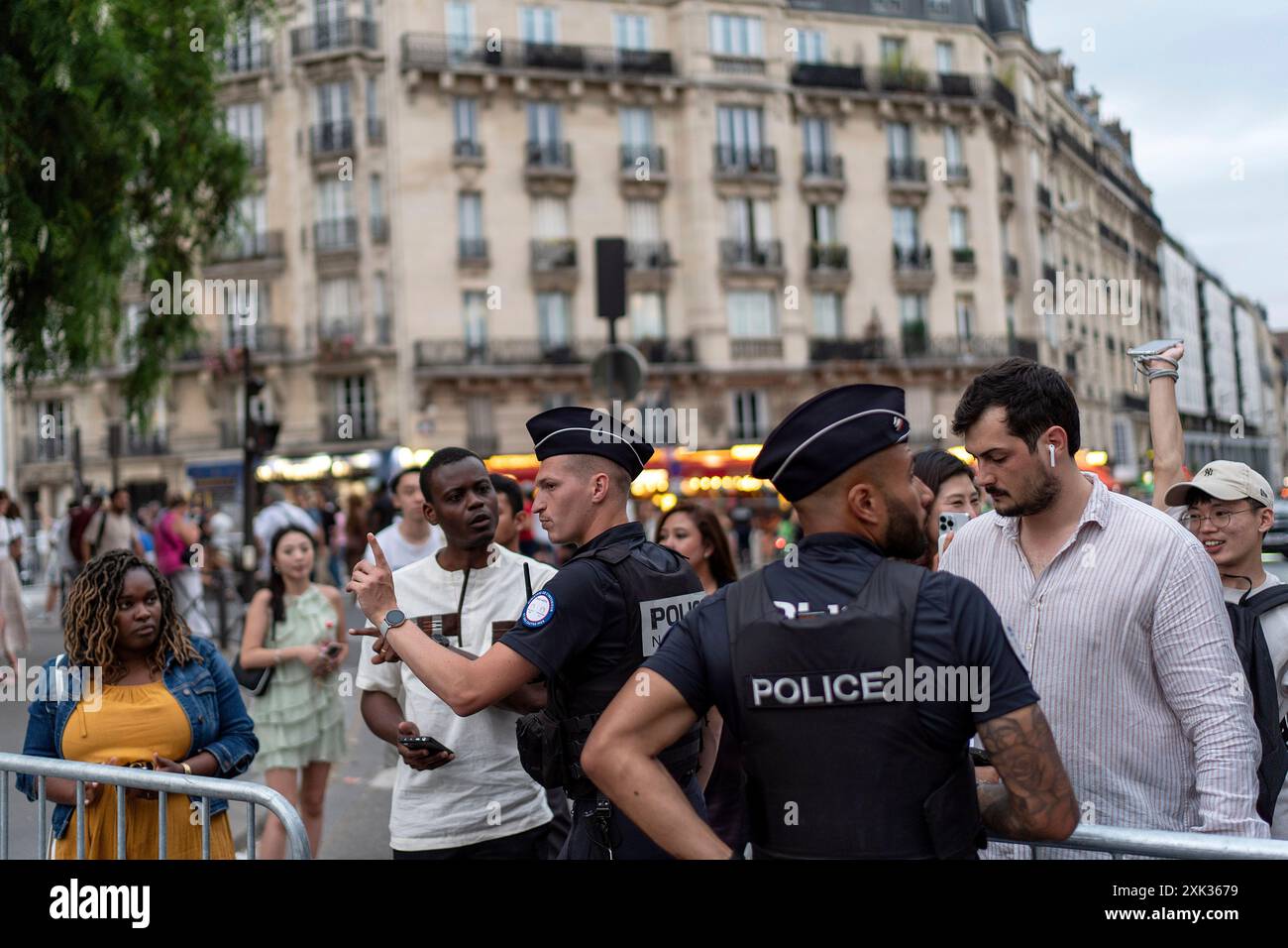 Police check the public for credentials to enter a security perimeter ...