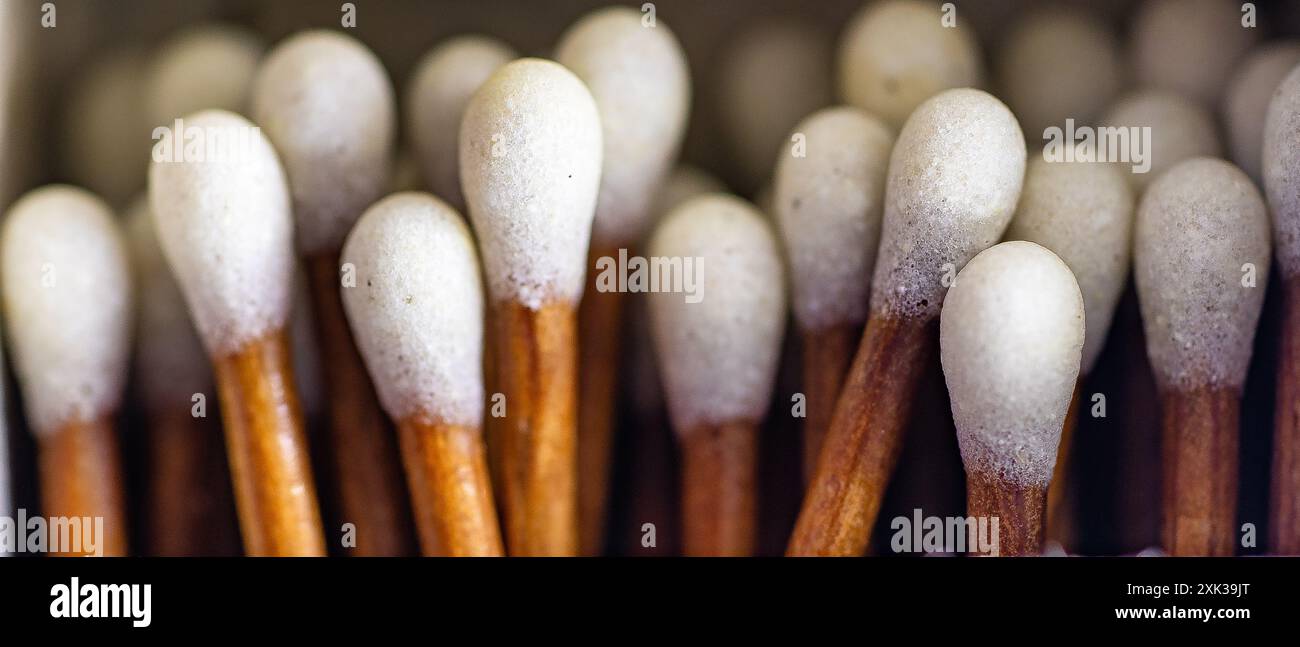Poorly aligned set of brown stick matches and white head Stock Photo ...