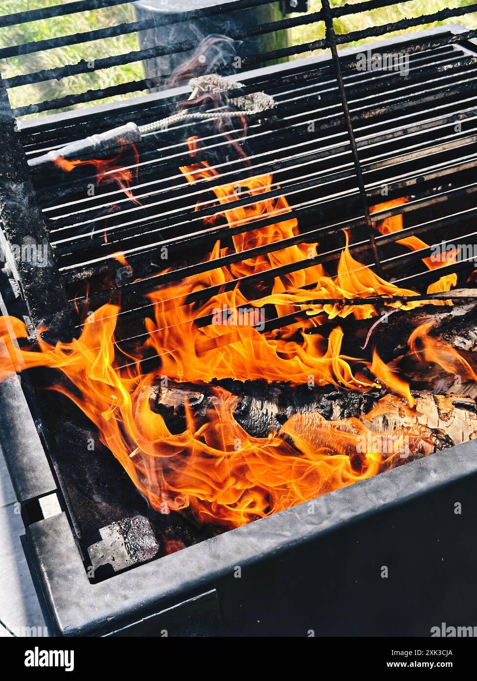 Barbecue Grill With Fire Flames. Open empty Fire Grid Stock Photo - Alamy