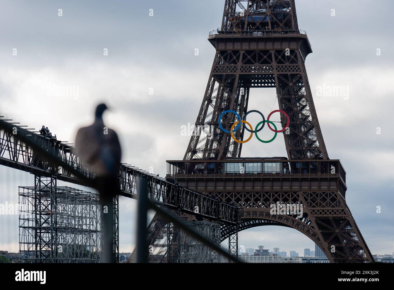 Construction site in the Trocadéro Gardens, in front of the Eiffel Tower adorned with Olympic ...