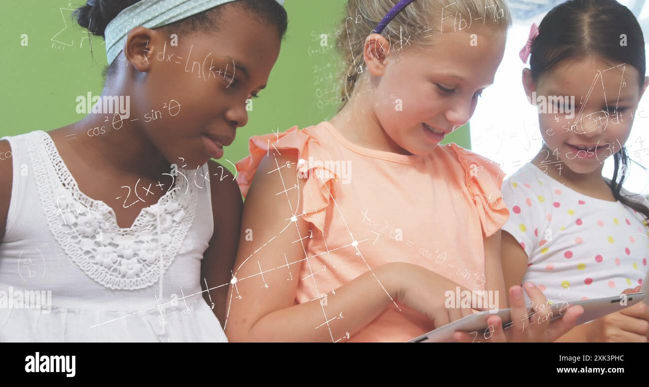 Image of math formulas over diverse pupils learning at school. learning ...