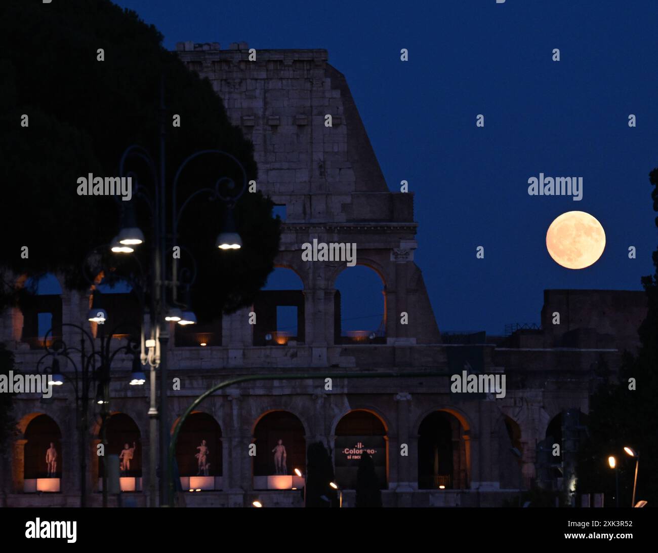 Rome, Italy. 20th July, 2024. A full moon is seen in the sky above the ...