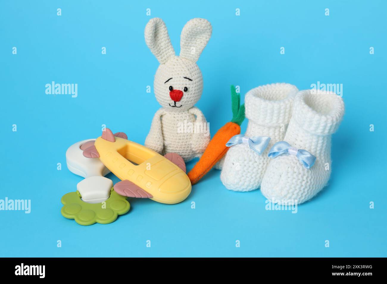 Newborn baby blue booties hi-res stock photography and images - Alamy