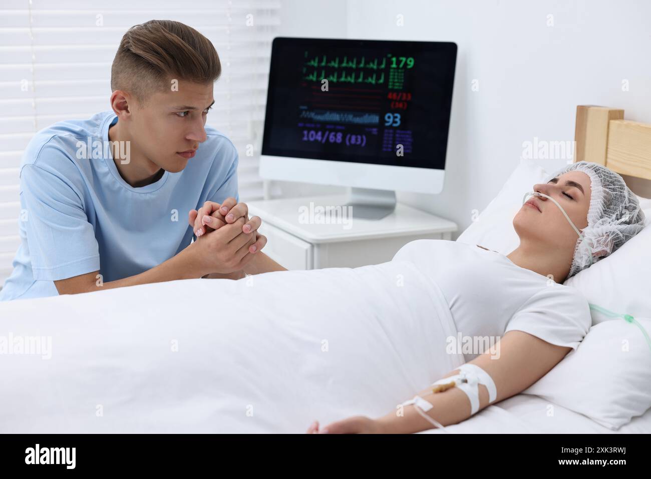 Hospital bed young man worried hi-res stock photography and images - Alamy