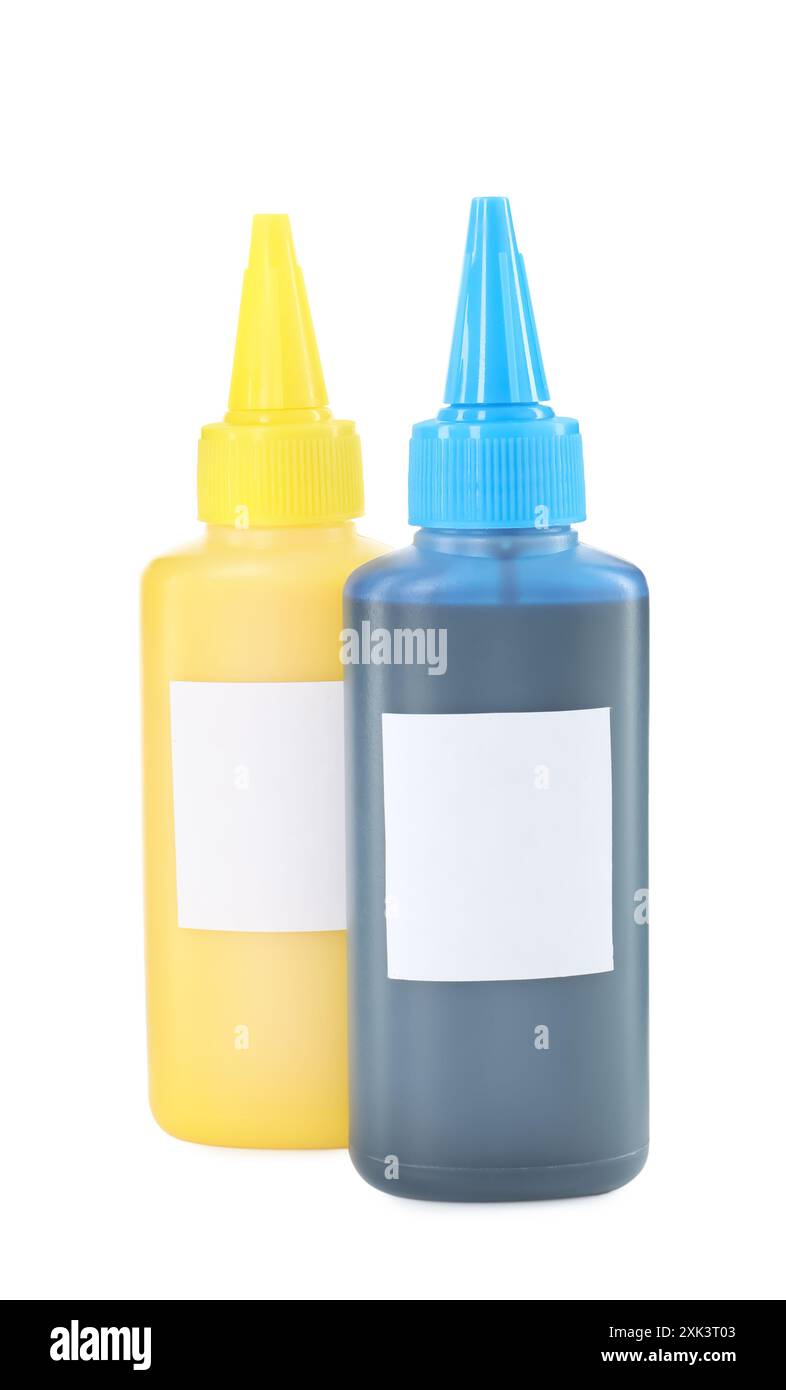 Bottles of different printer ink isolated on white Stock Photo - Alamy