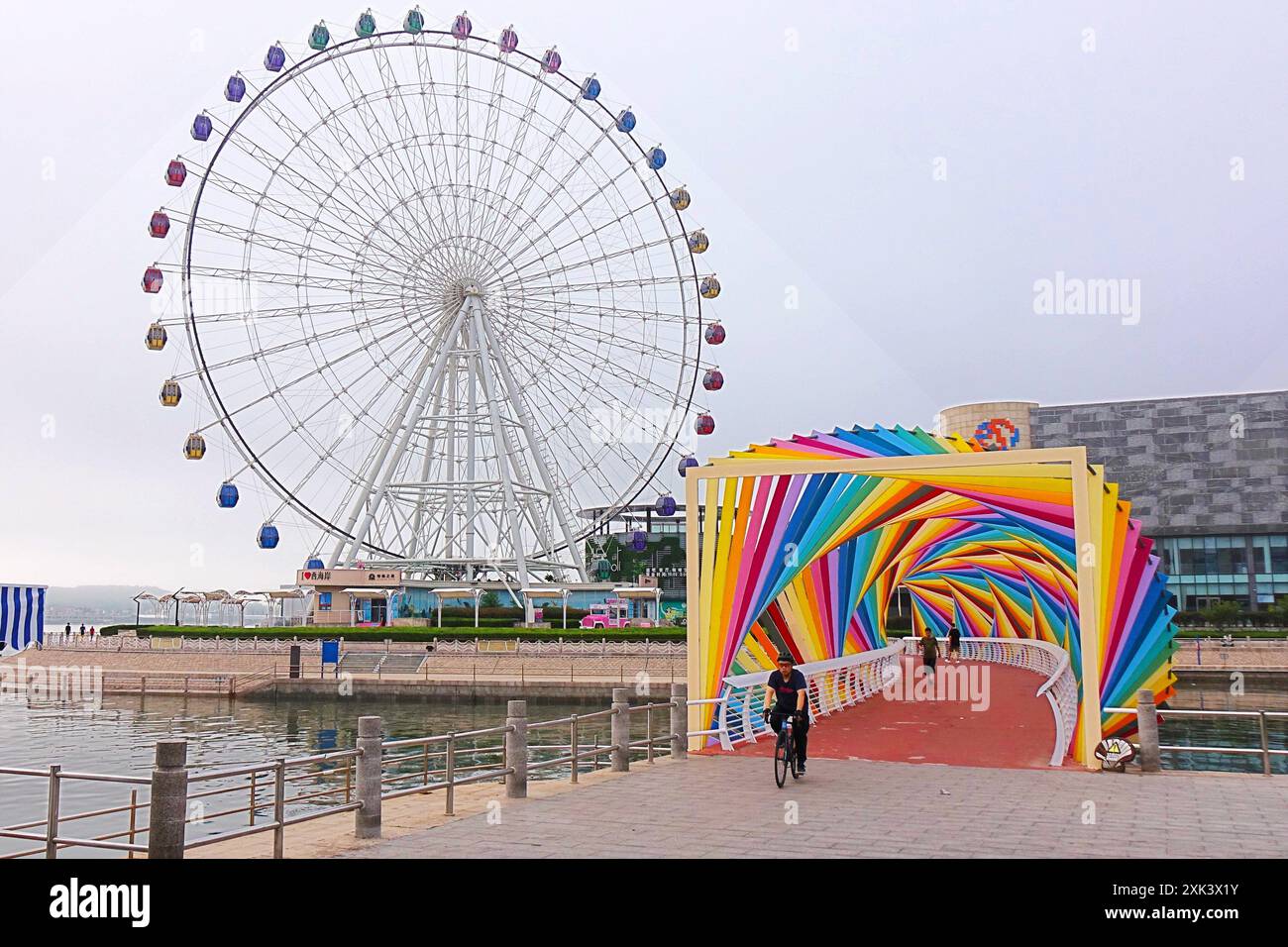 QINGDAO, CHINA - JULY21, 2024 - Tourists enjoy the colorful Rainbow ...