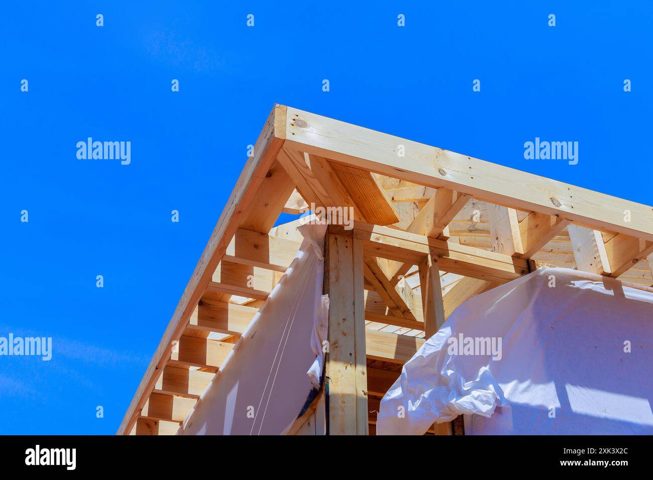 In construction of new house, wood frame beams are used for framing ...