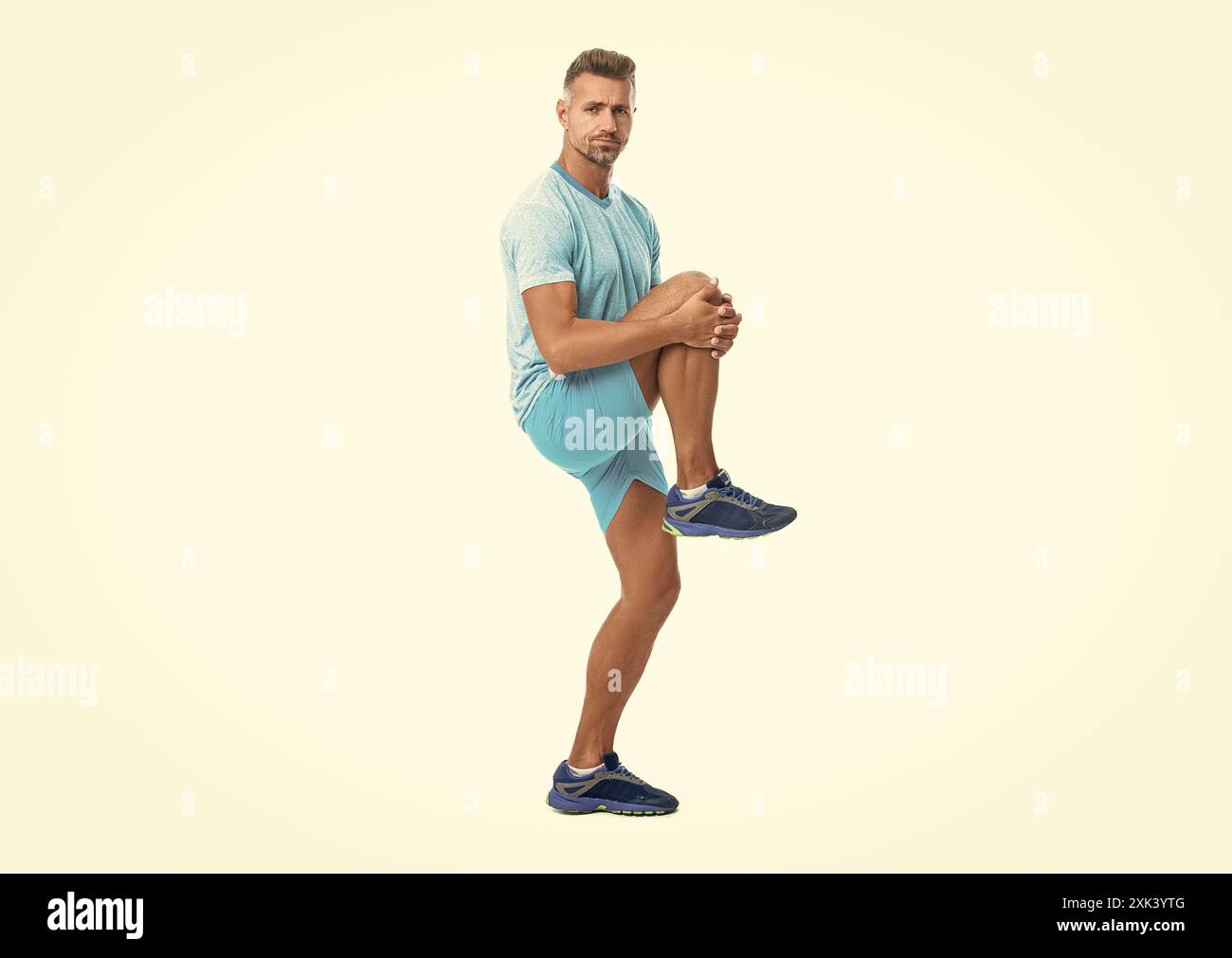 stretching routine of fit athlete isolated on white. athlete stretching ...
