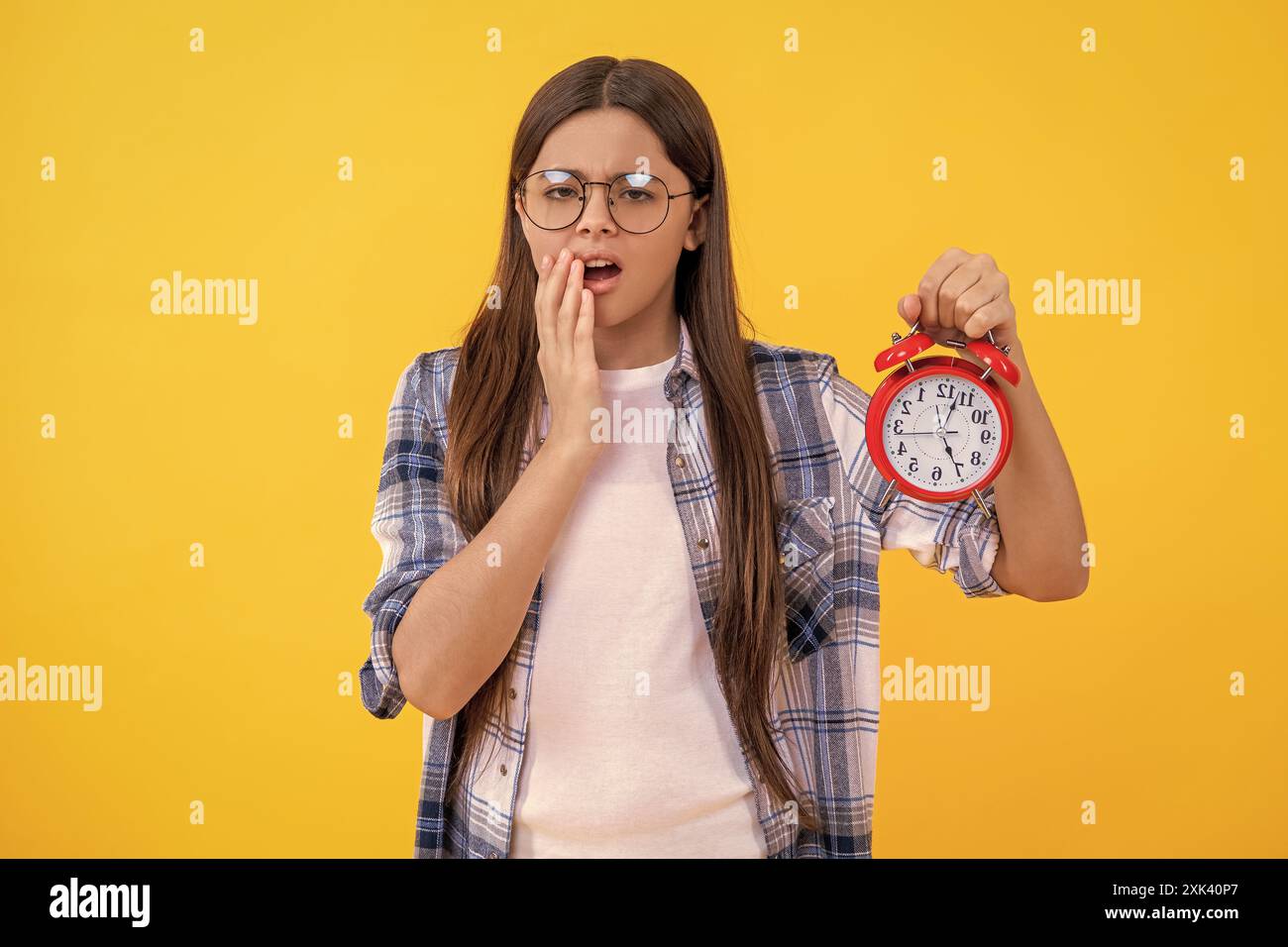 school time schedule. teen girl with alarm clock. Time ticking for a ...
