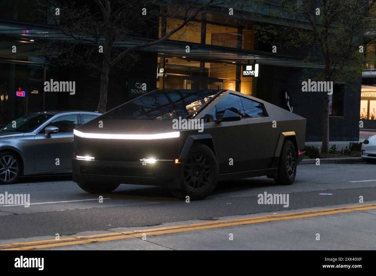 Seattle, USA. 15 Apr, 2024. A matte black wrapped Tesla Cybertruck on ...