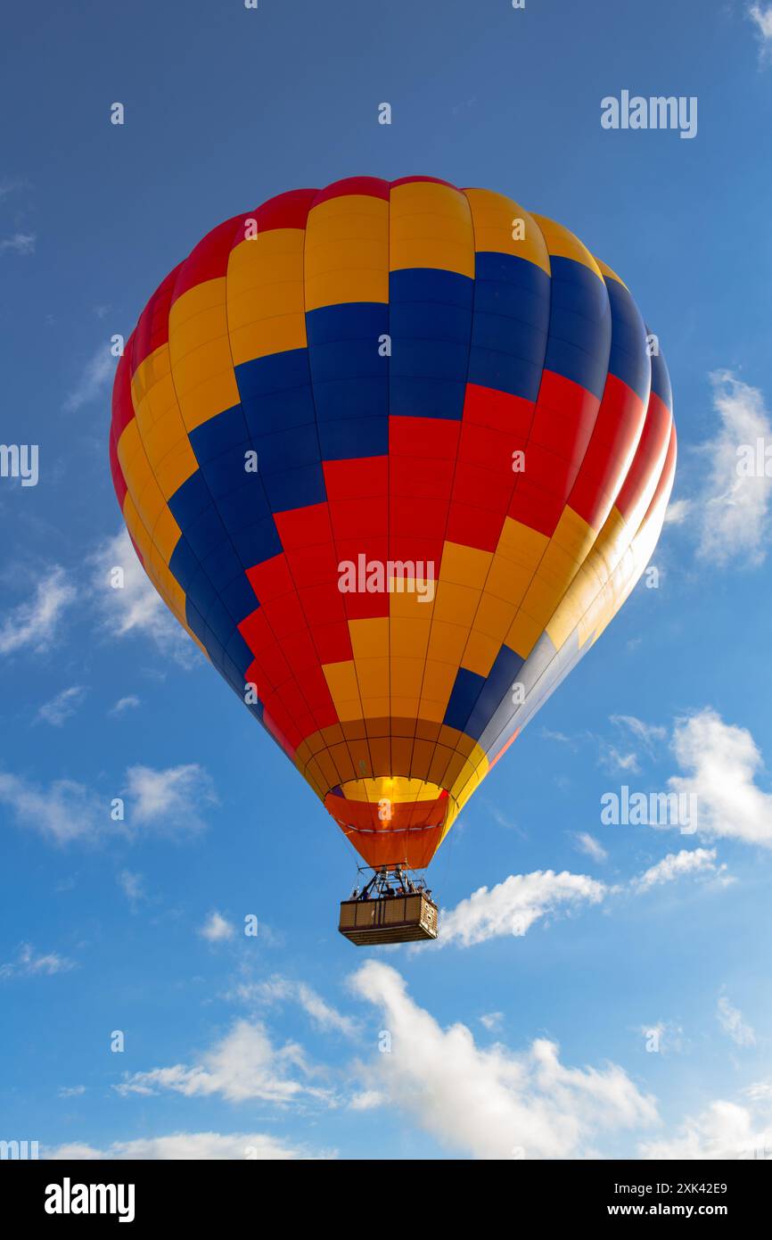 Colorful hot air balloon floating over Pagosa Springs, Colorado, USA ...