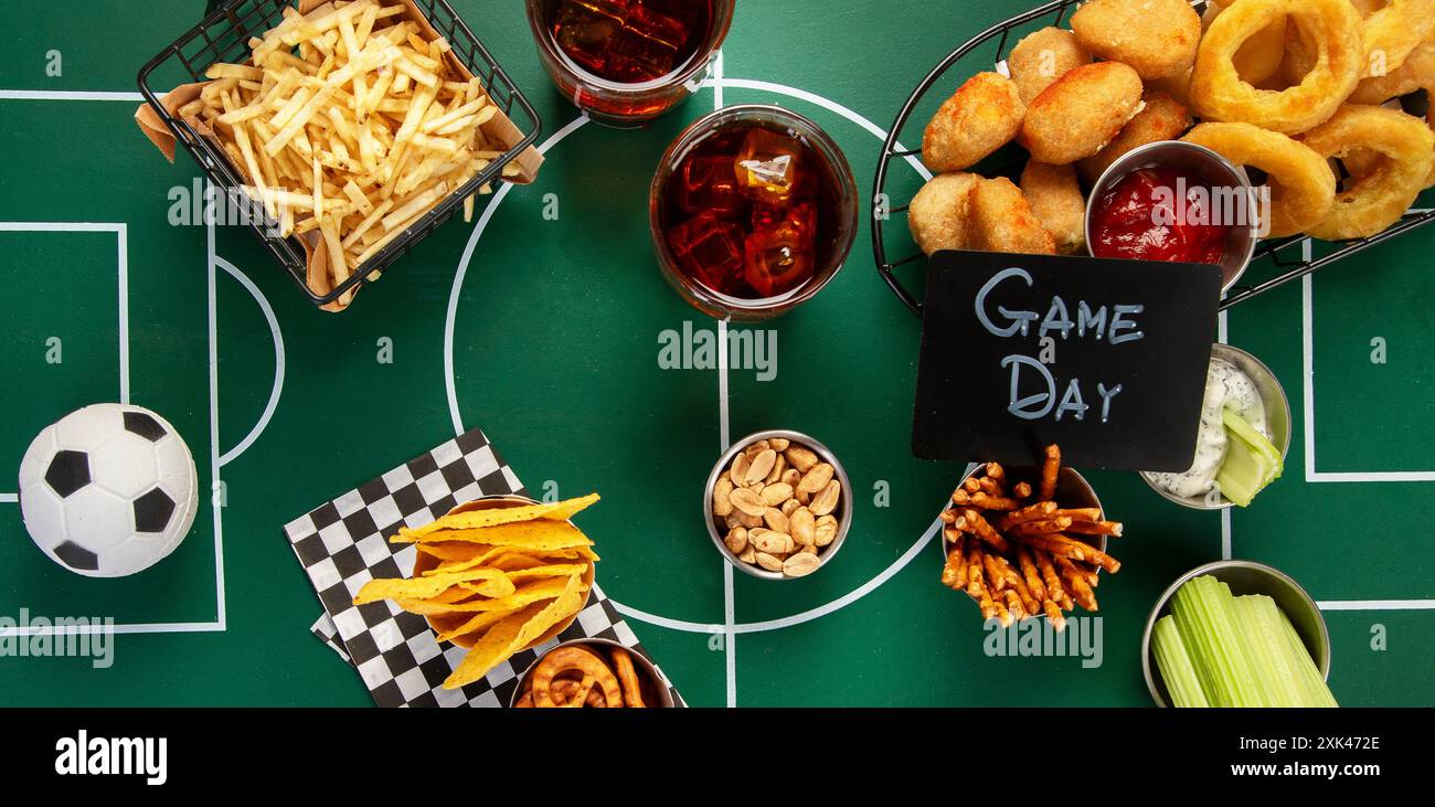 Football game watch party food and snacks on a football field. Football ...