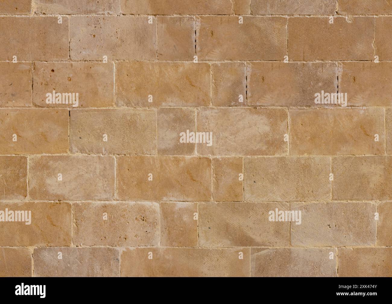 Seamless beige stone wall texture Stock Photo - Alamy