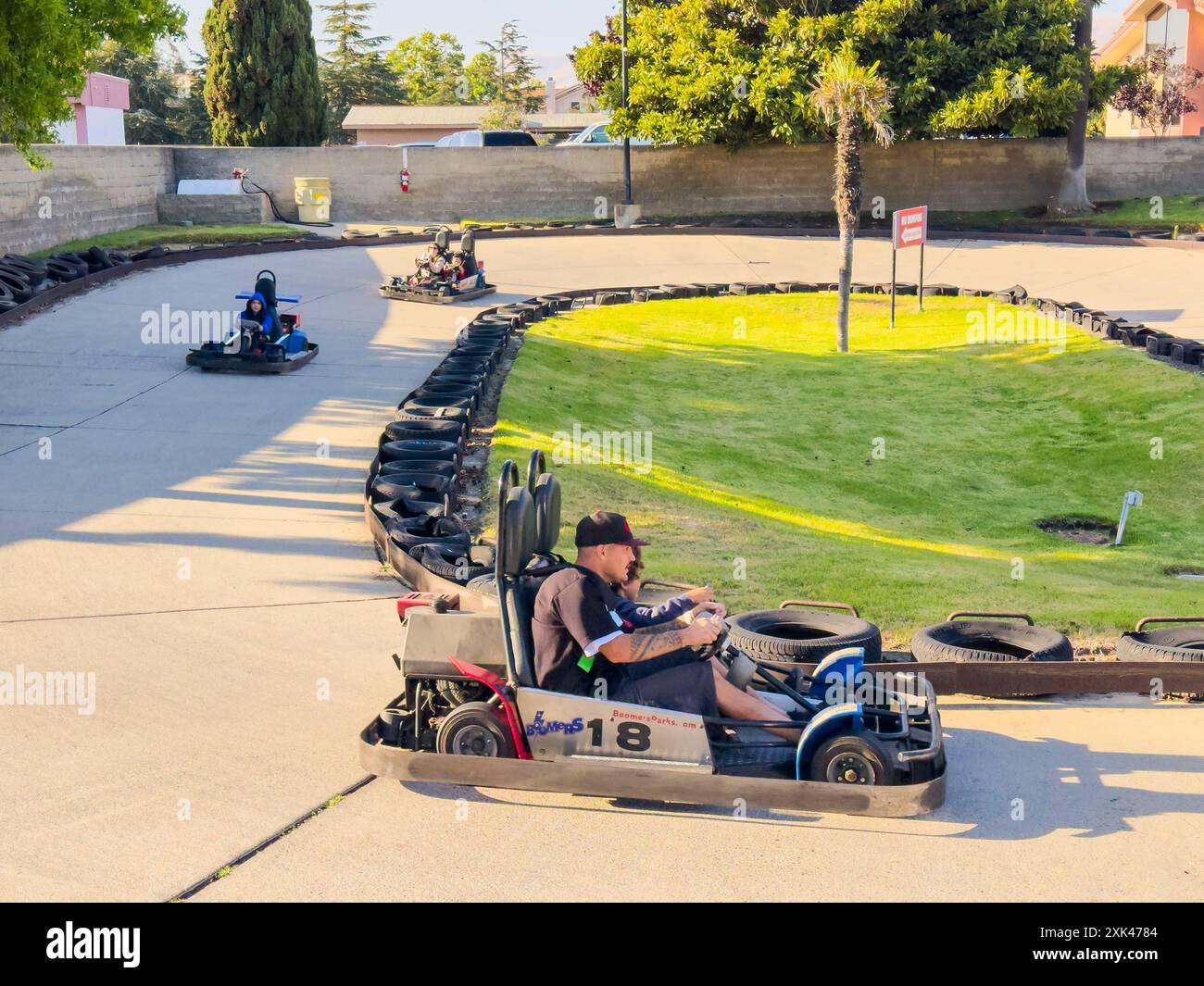 Santa Maria, California, USA - July 20, 2024. People enjoying a go-kart ...