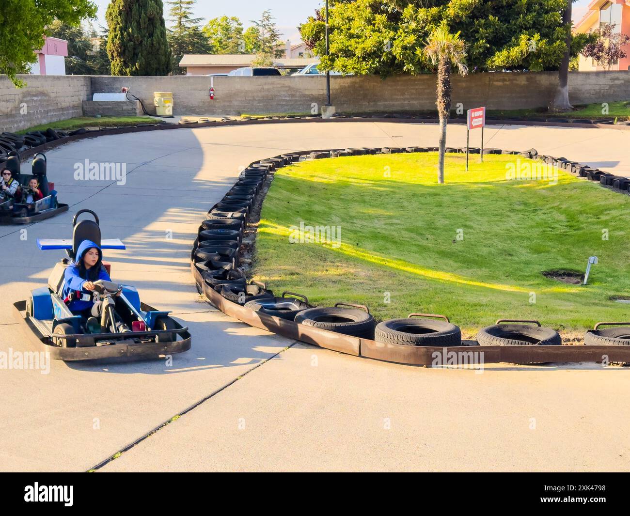 Santa Maria, California, USA - July 20, 2024. People enjoying a go-kart ...