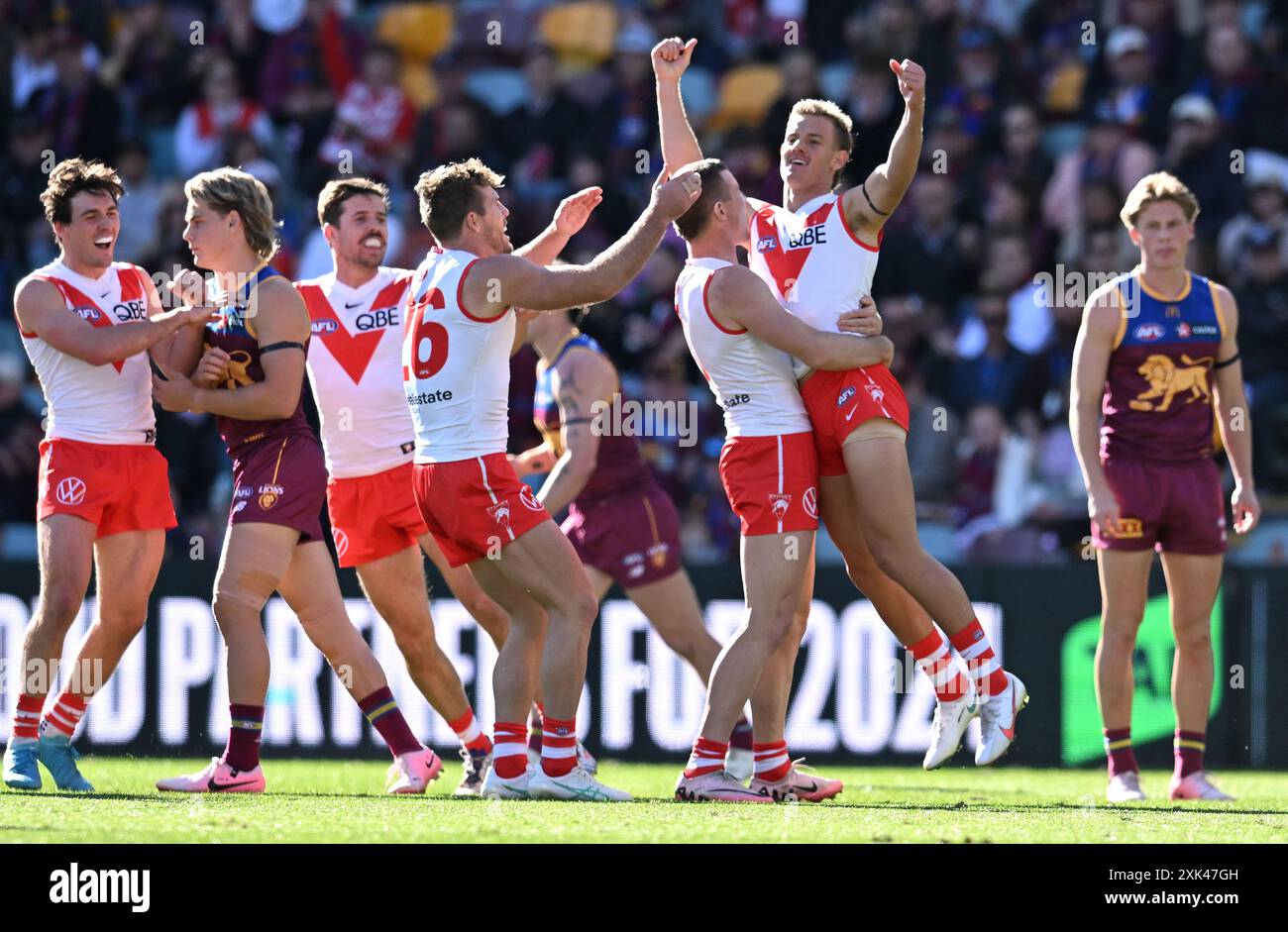 Brisbane, Australia. 21st July, 2024. Corey Warner (centre) of the ...