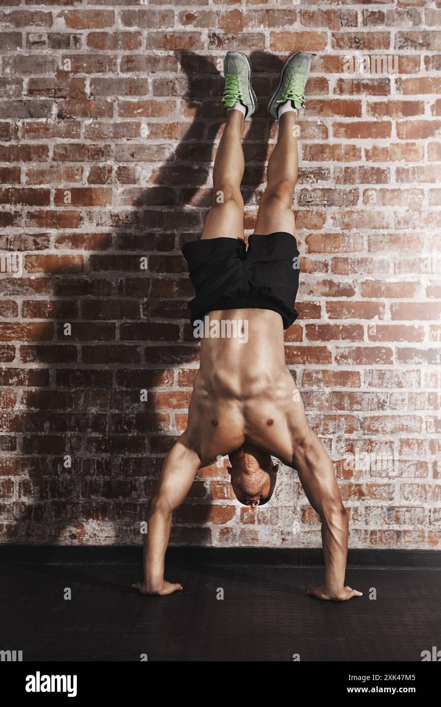 Brick handstand hi-res stock photography and images - Alamy