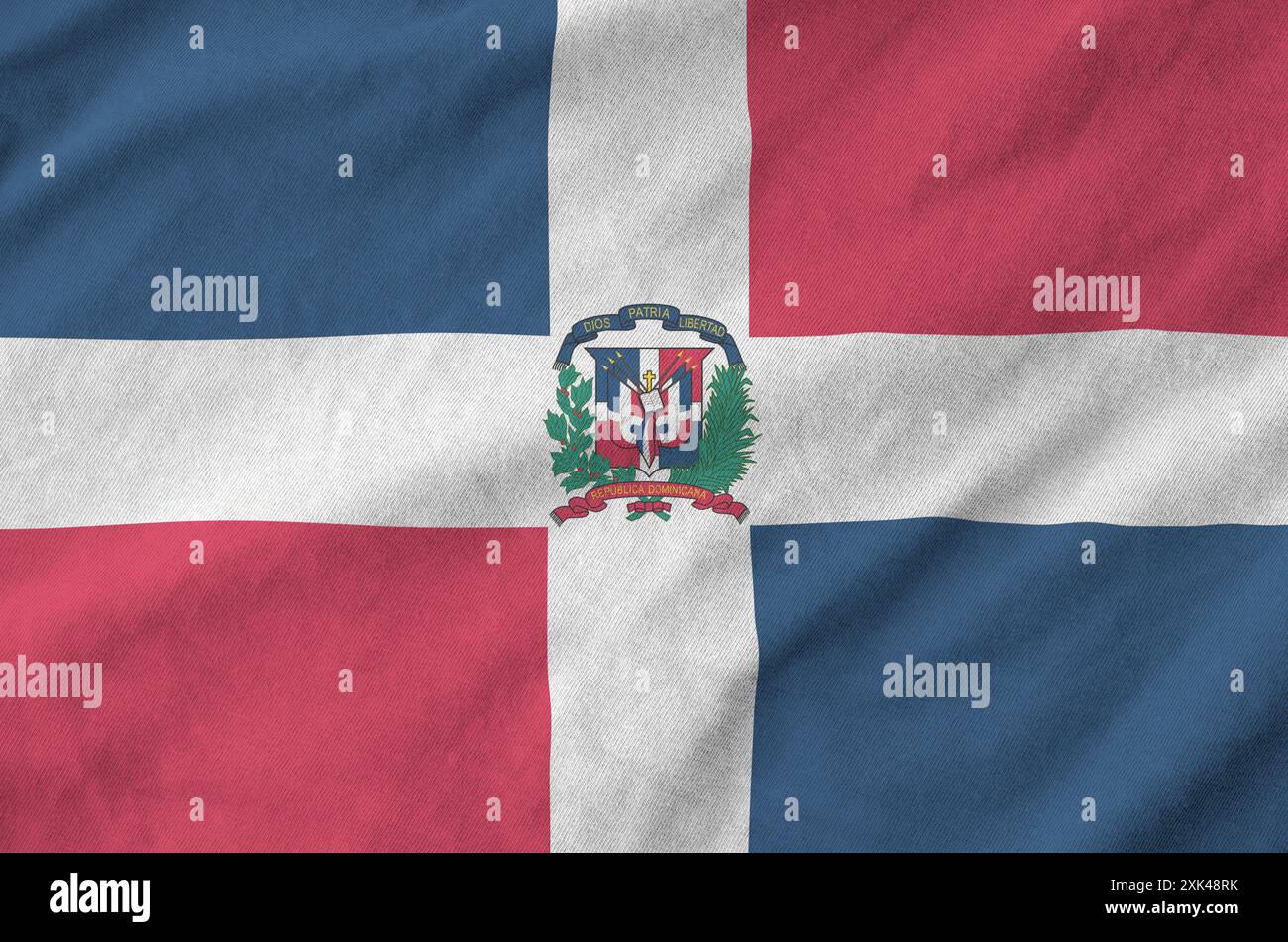 Dominican Republic flag depicted on folded wavy fabric of old cloth ...