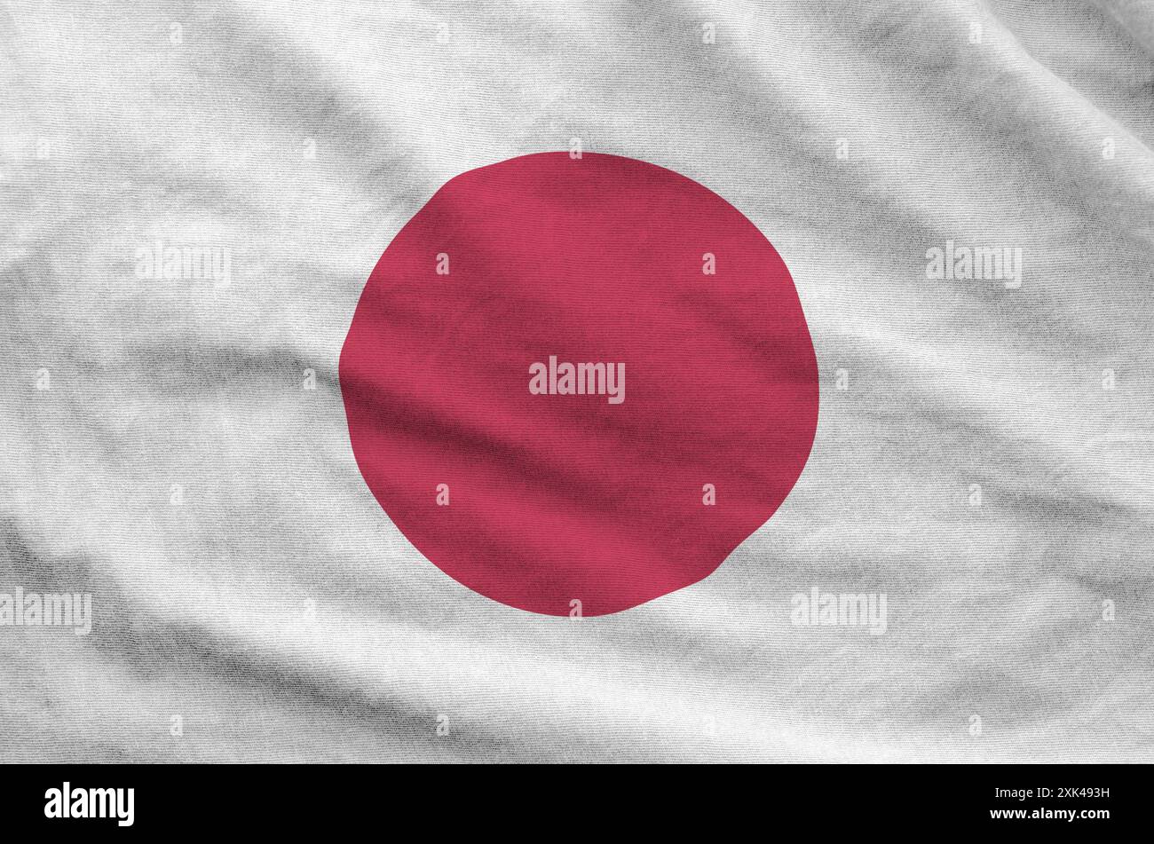 Japan flag depicted on folded wavy fabric of old cloth close up Stock ...