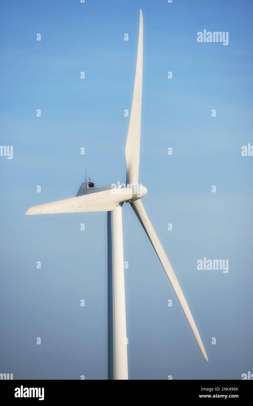 Windmill, clean energy and outdoor by blue sky for sustainability with ...