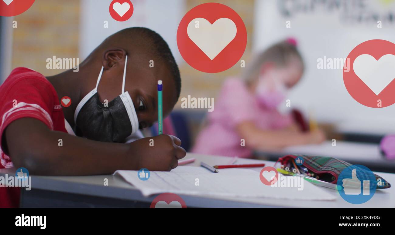 Image of social media icons over school children in classroom. Global ...