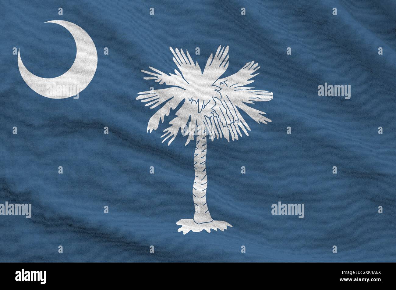 South Carolina US state flag depicted on folded wavy fabric of old ...