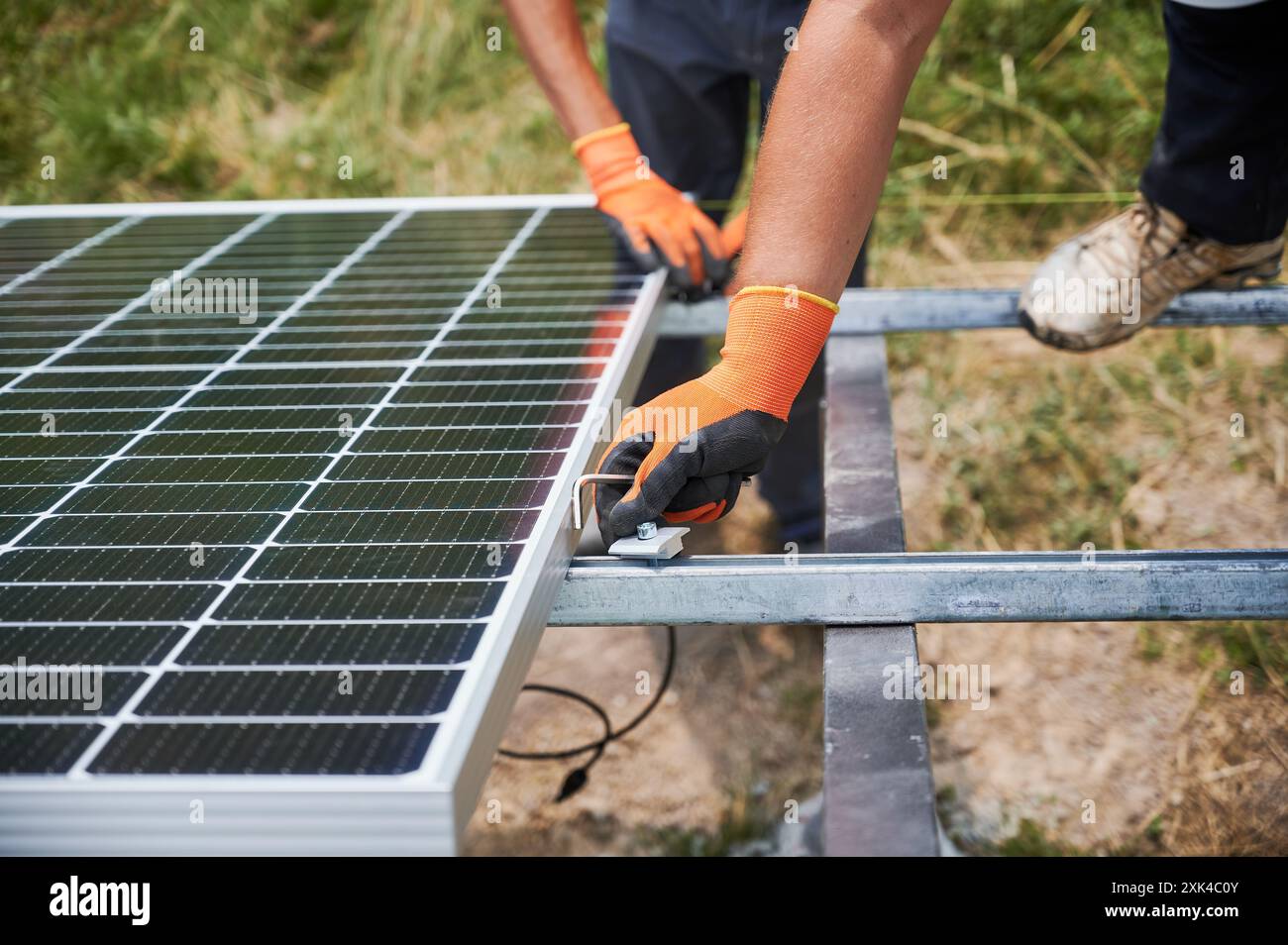 Worker tightening solar panel hi-res stock photography and images - Alamy