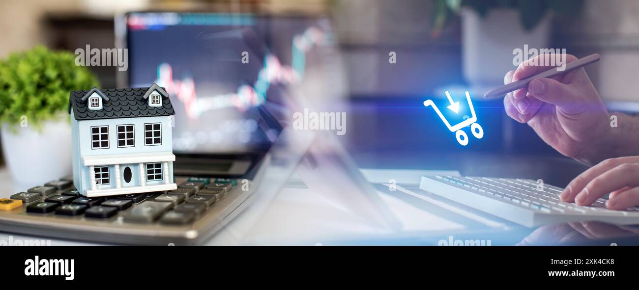 A real estate agent uses a calculator and a laptop computer to ...
