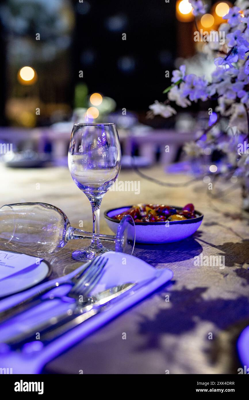 Luxury table settings for fine dining with and glassware, pouring wine ...