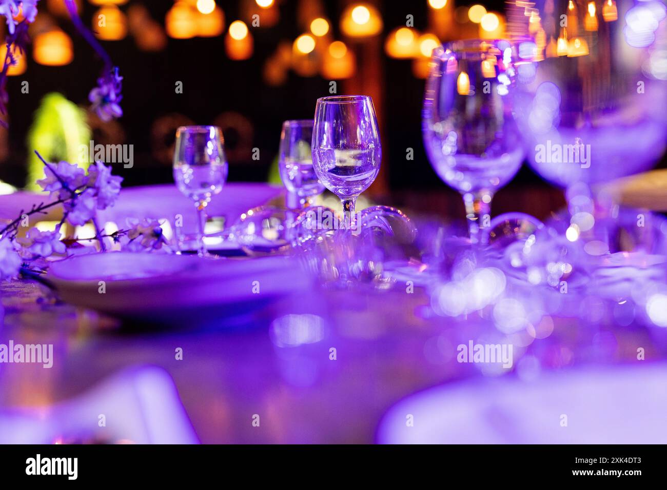 Luxury table settings for fine dining with and glassware, pouring wine ...