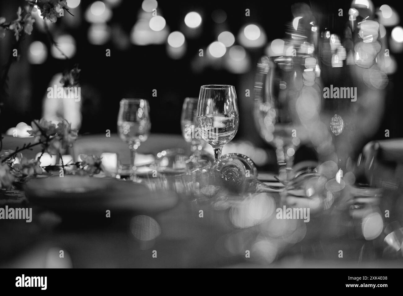Luxury table settings for fine dining with and glassware, pouring wine ...