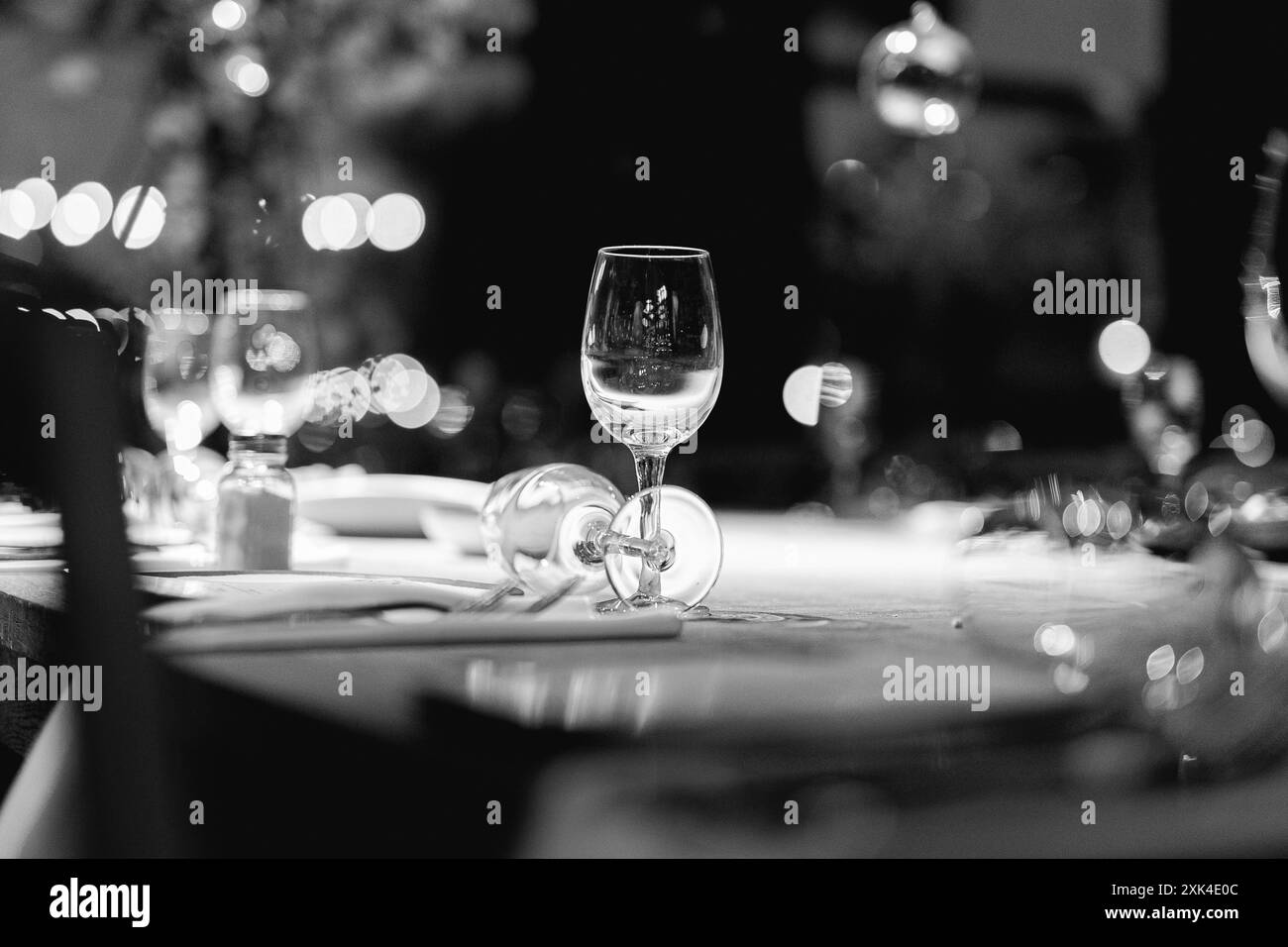 Luxury table settings for fine dining with and glassware, pouring wine ...