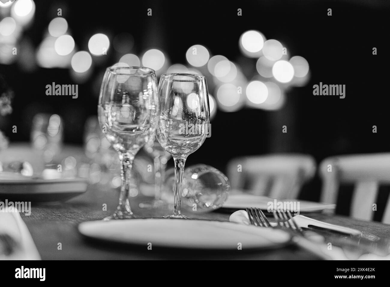 Luxury table settings for fine dining with and glassware, pouring wine ...