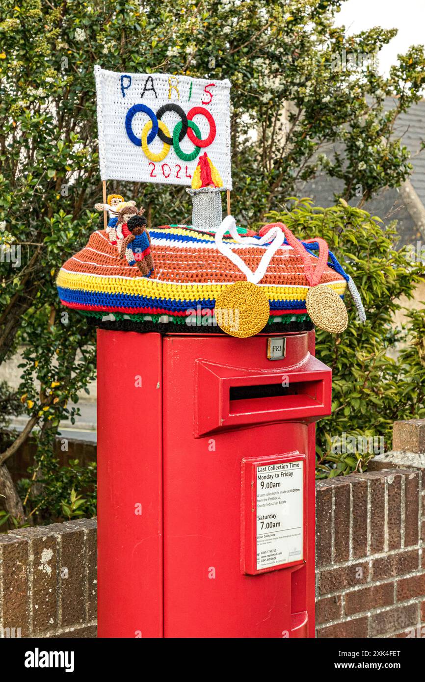 Colourful knitted post box topper celebrating the Paris 2024 Olympics ... Colourful knitted post box topper celebrating the Paris 2024 Olympics ...