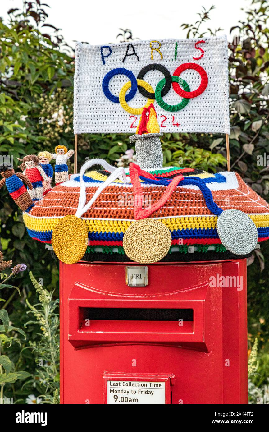 Colourful knitted post box topper celebrating the Paris 2024 Olympics ... Colourful knitted post box topper celebrating the Paris 2024 Olympics ...