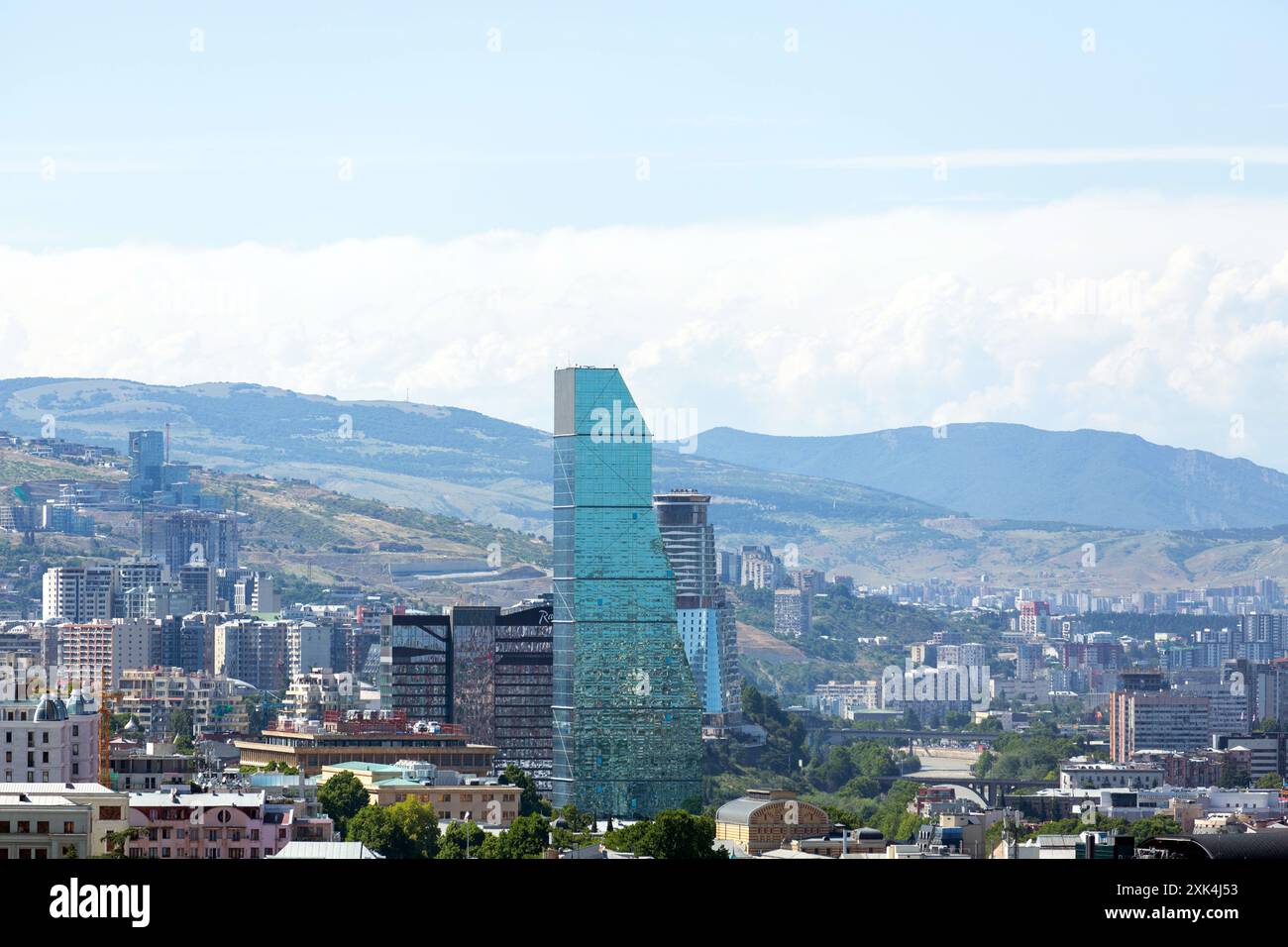 Tbilisi, Georgia - 22 JUNE, 2024: The glass tower of the Biltmore Hotel Tbilisi, the first glass ...