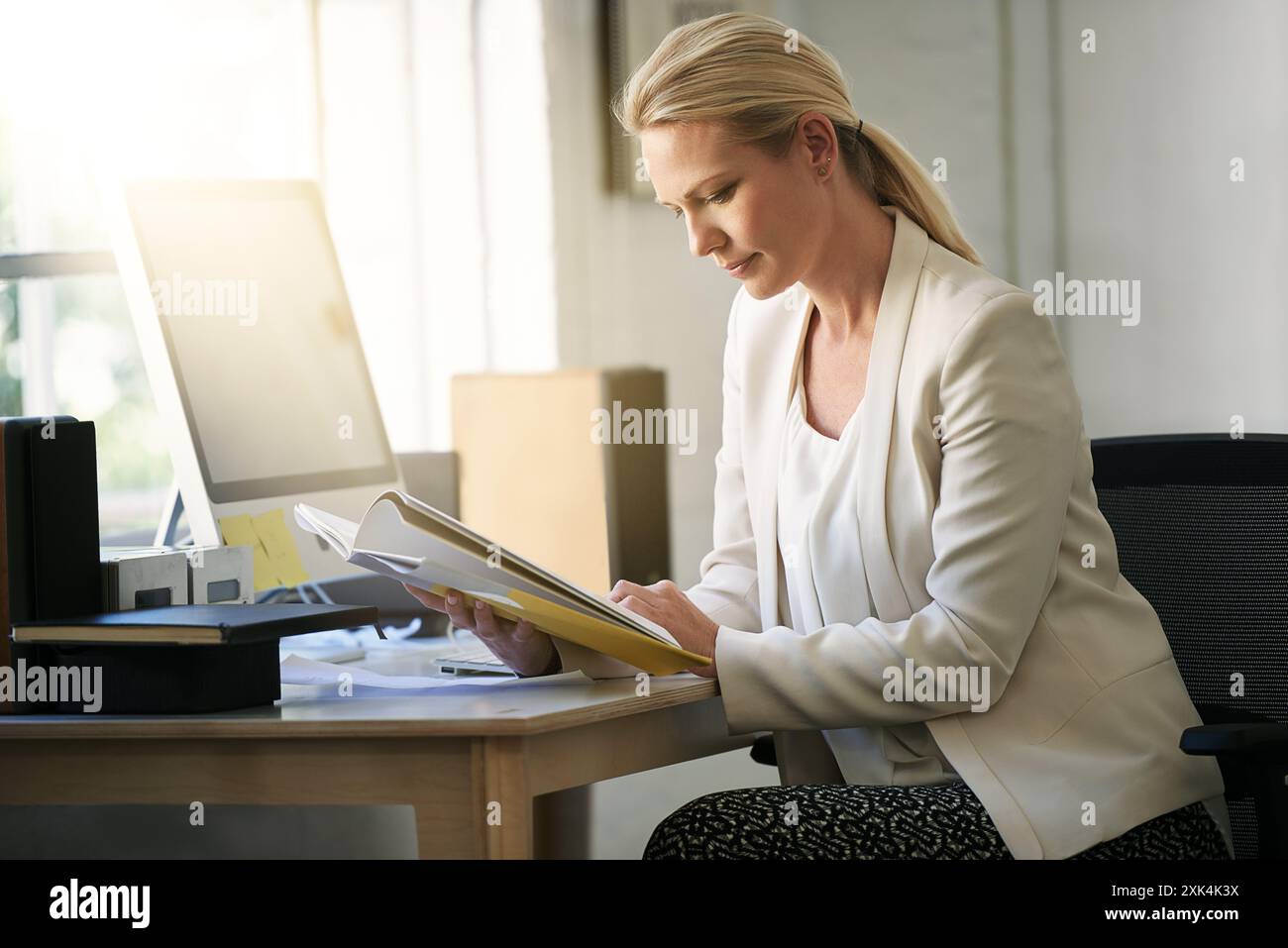 Office, reading and business woman with paperwork for editing, grammar ...