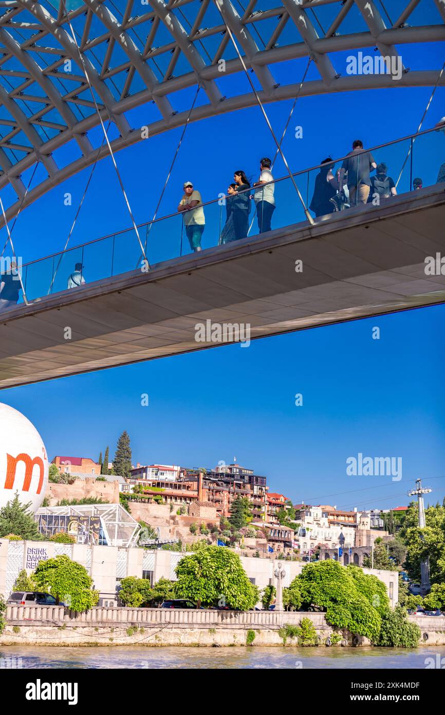 Tbilisi, Georgia - June 22, 2024: The Bridge of Peace is a bow shaped ...