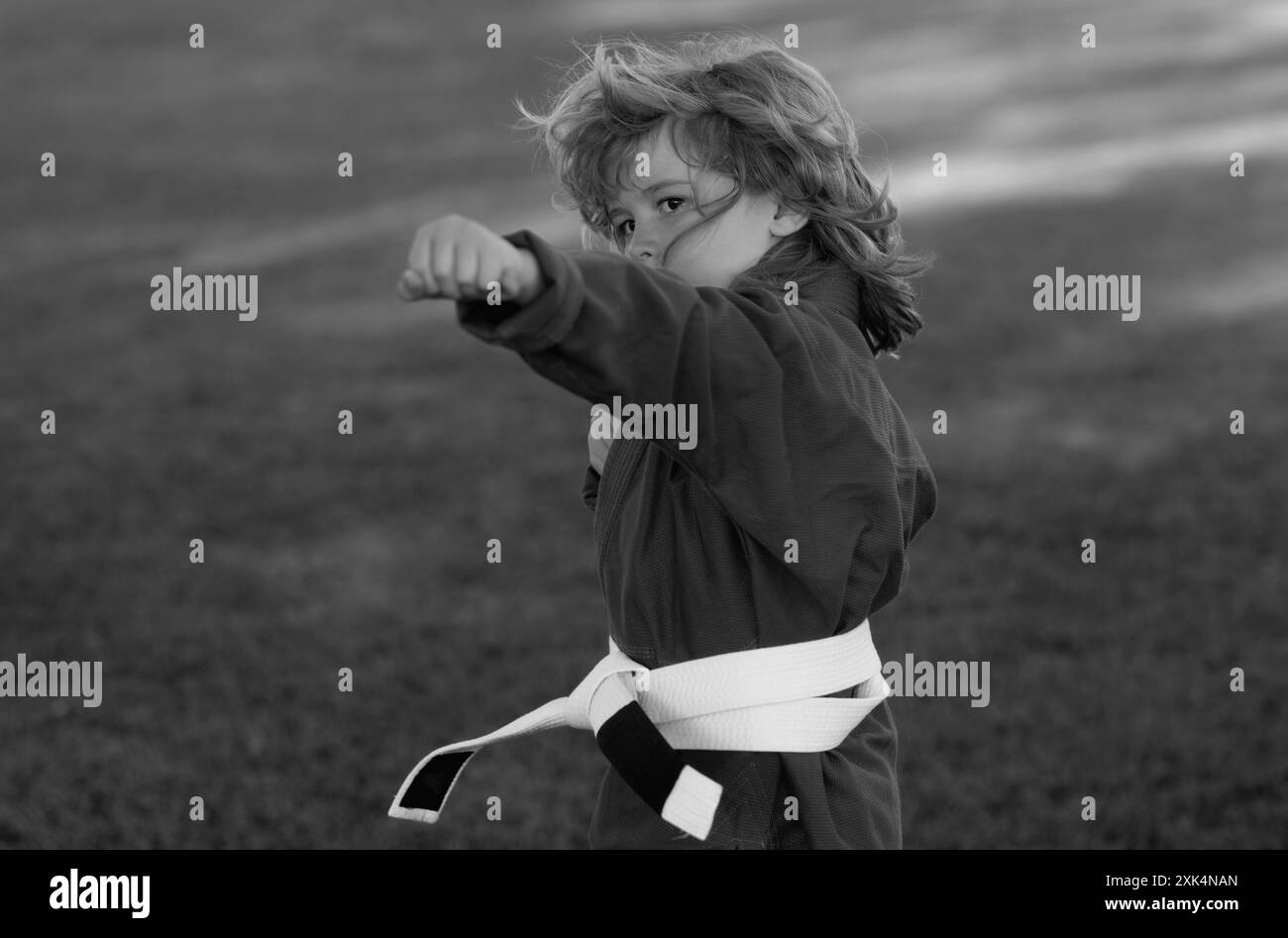 Kid boy practicing martial arts outdoor. Sport karate kids. Little boy ...