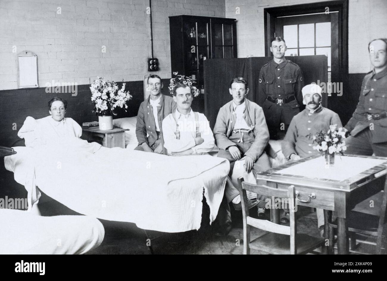 Wounded soldiers in hospital alongside Royal Army Medical Corps orderlies durinf the First World ...