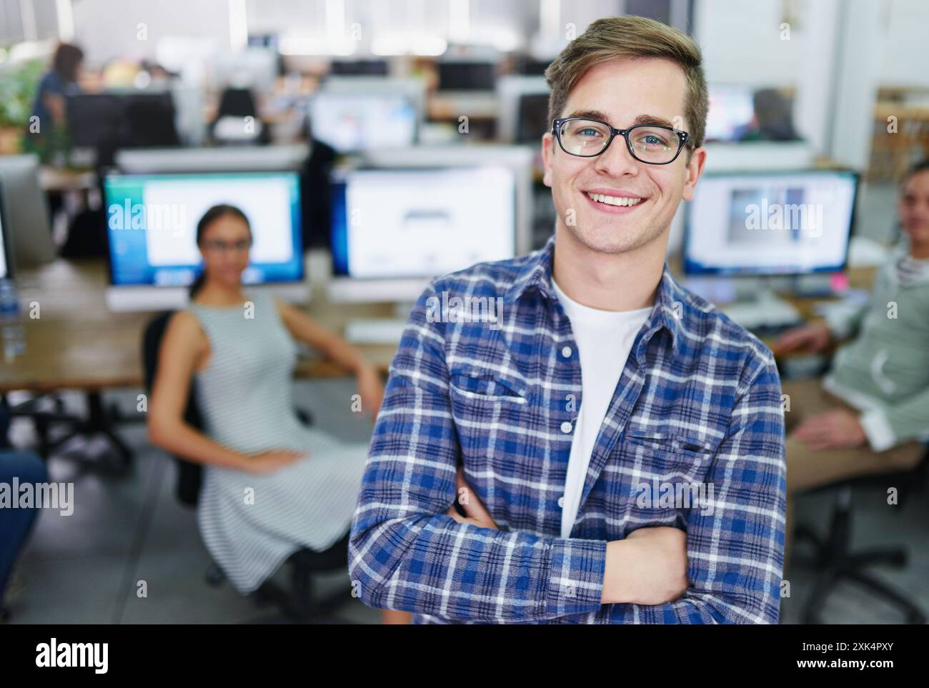 Portrait, arms crossed and man in office, glasses and employee with smile, coworking and ...