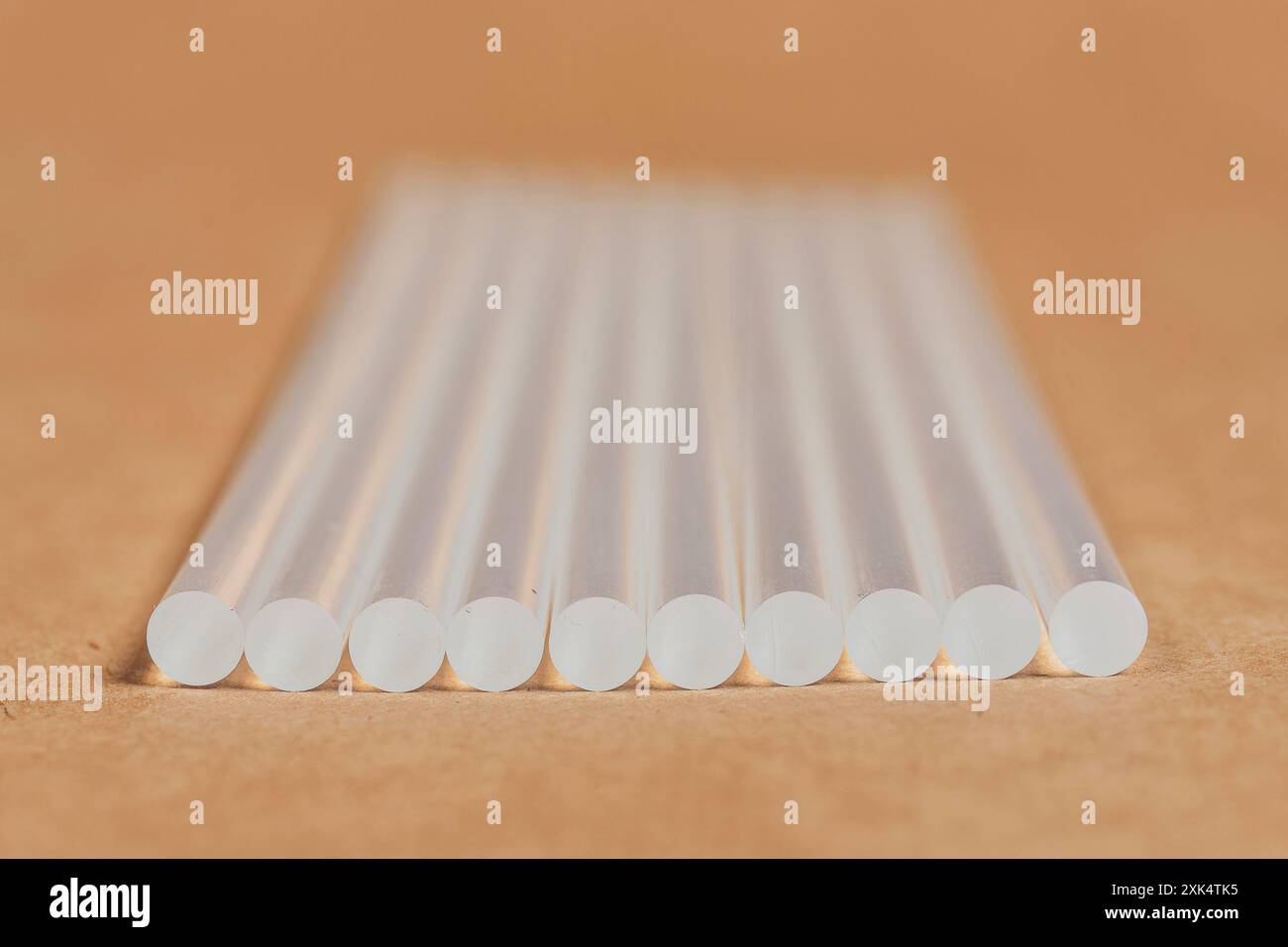 hot glue sticks on brown paper background. rods for pistol gluing ...