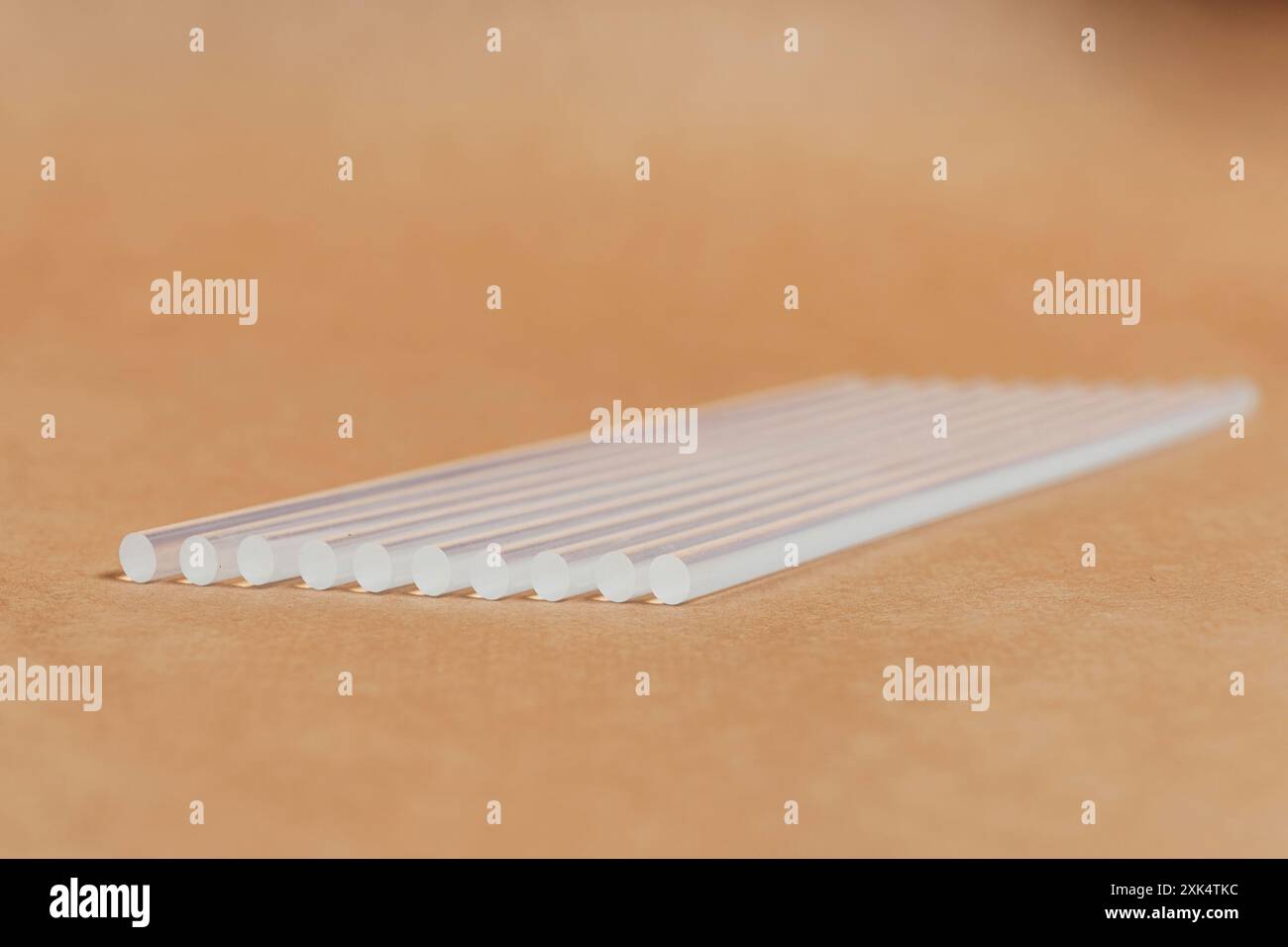 hot glue sticks on brown paper background. rods for pistol gluing ...