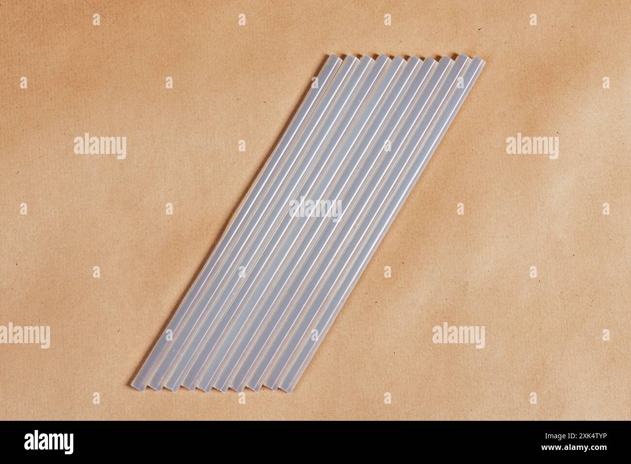 hot glue sticks on brown paper background. rods for pistol gluing ...