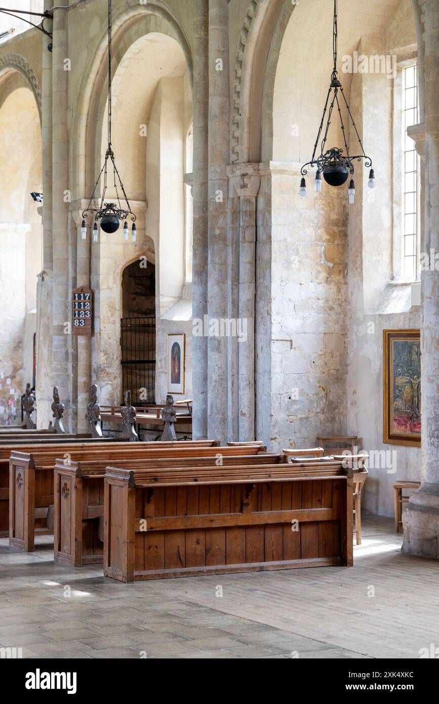 Interior of Binham Priory, showing some of the pews, bench carvings and ...