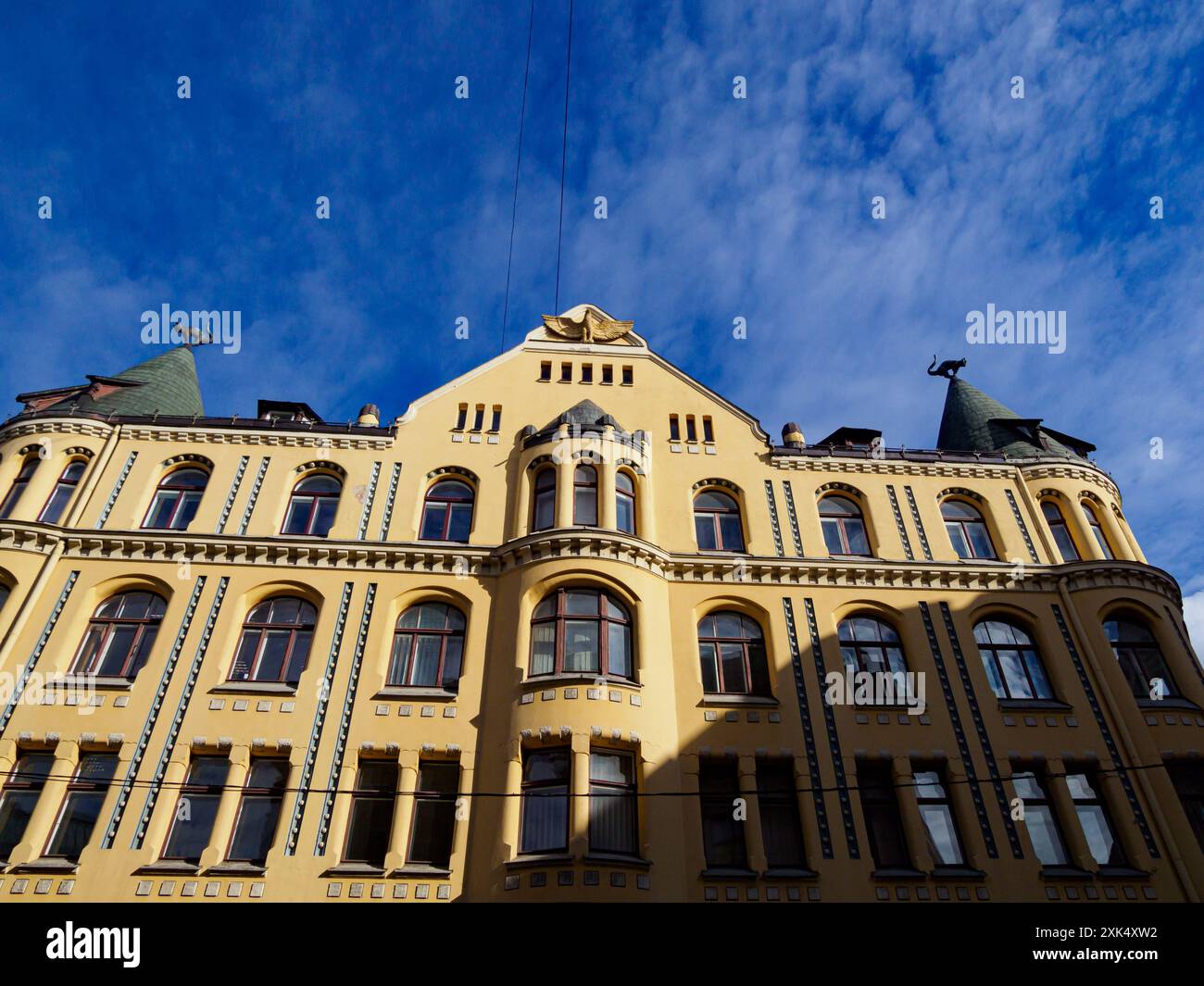 Riga, Latvia - Sep, 2022: Yellow Cat House with Black cats sculptures ...